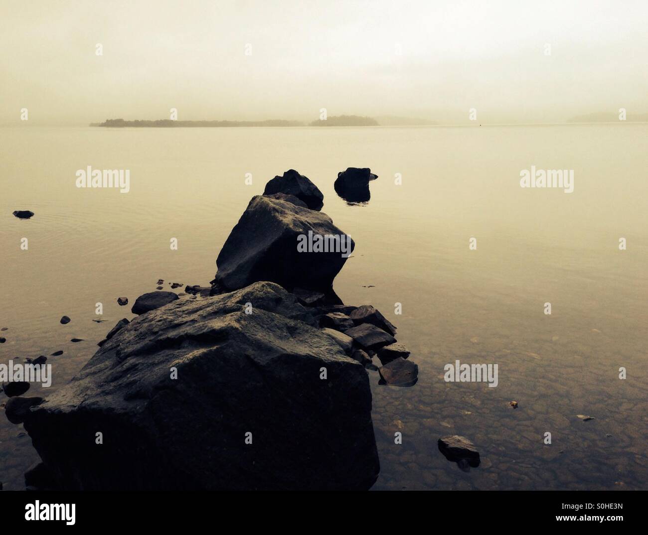 Rocks in Water Stock Photo - Alamy