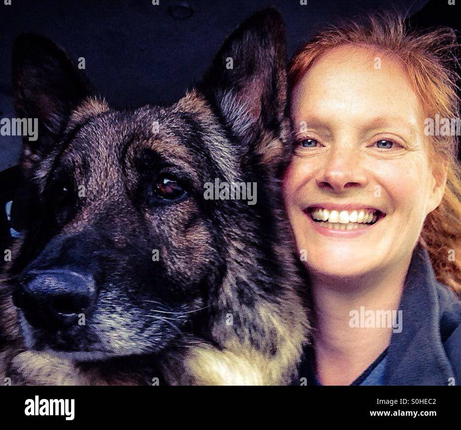 Girl with german shepherd dog hi-res stock photography and images - Alamy