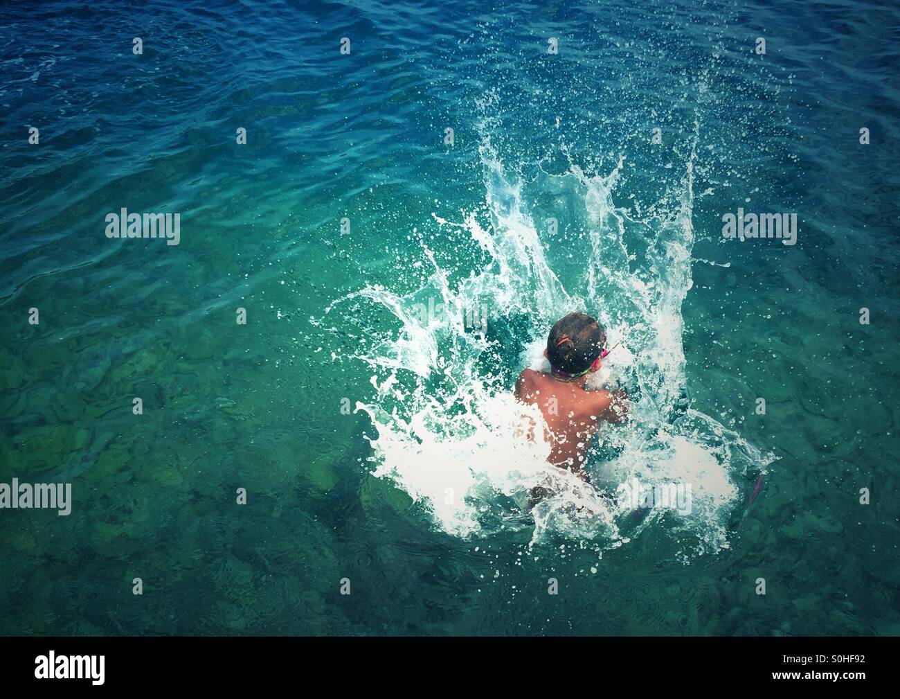 Jumping in water hi-res stock photography and images - Alamy