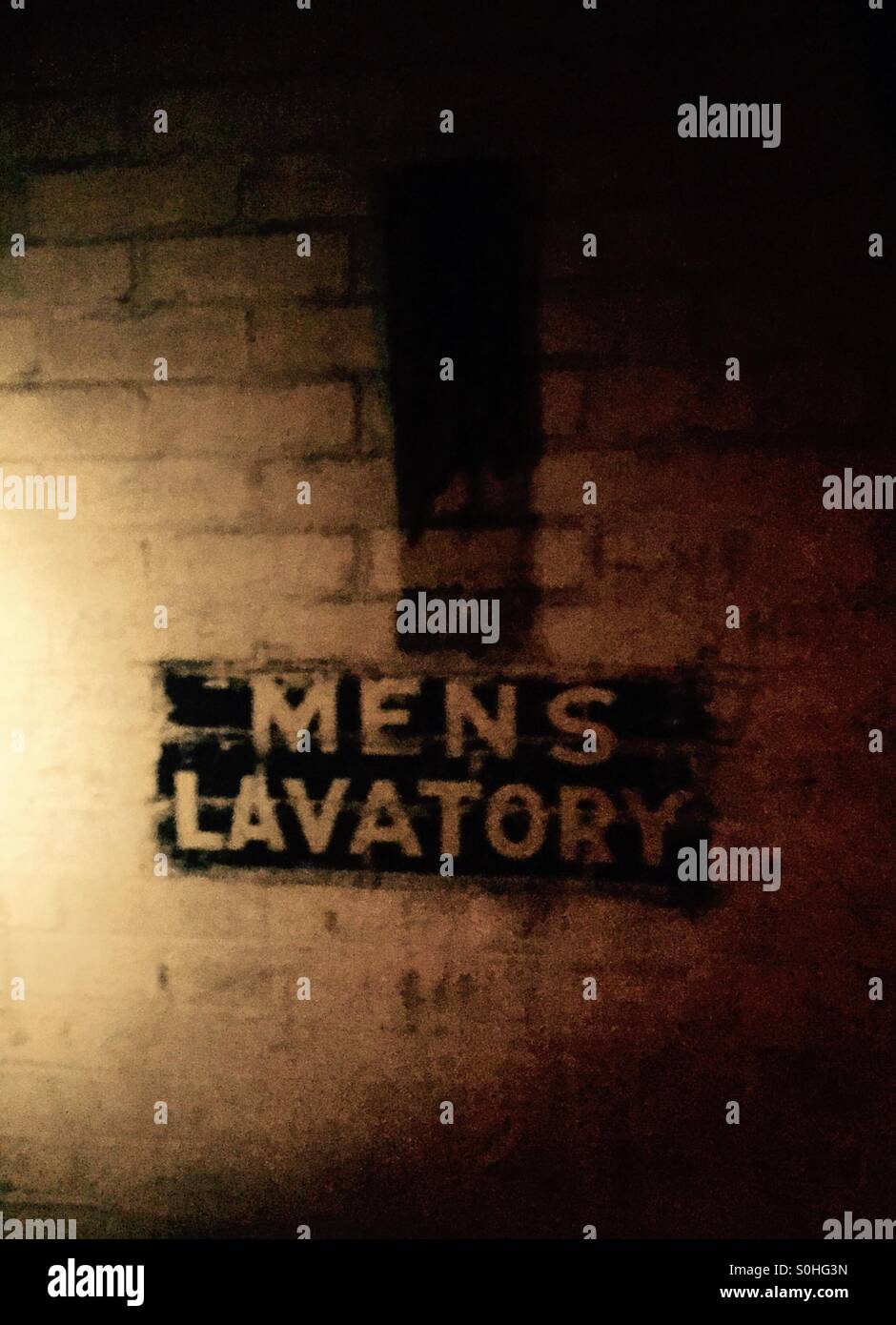 Old painted mens lavatory sign Stock Photo - Alamy