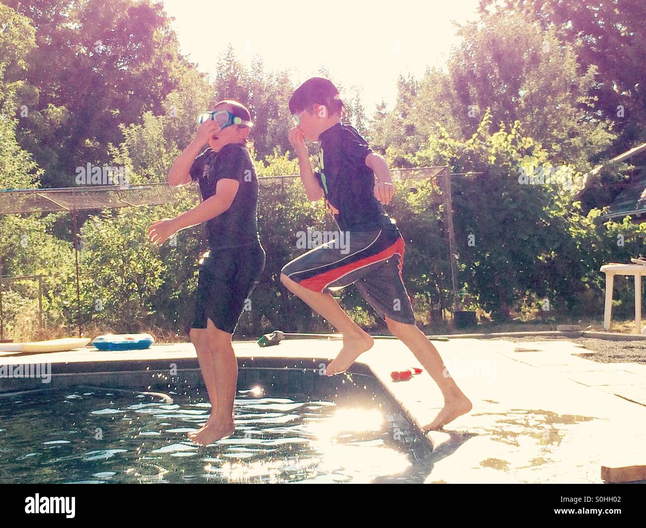 Jumping in a pool hi-res stock photography and images - Alamy