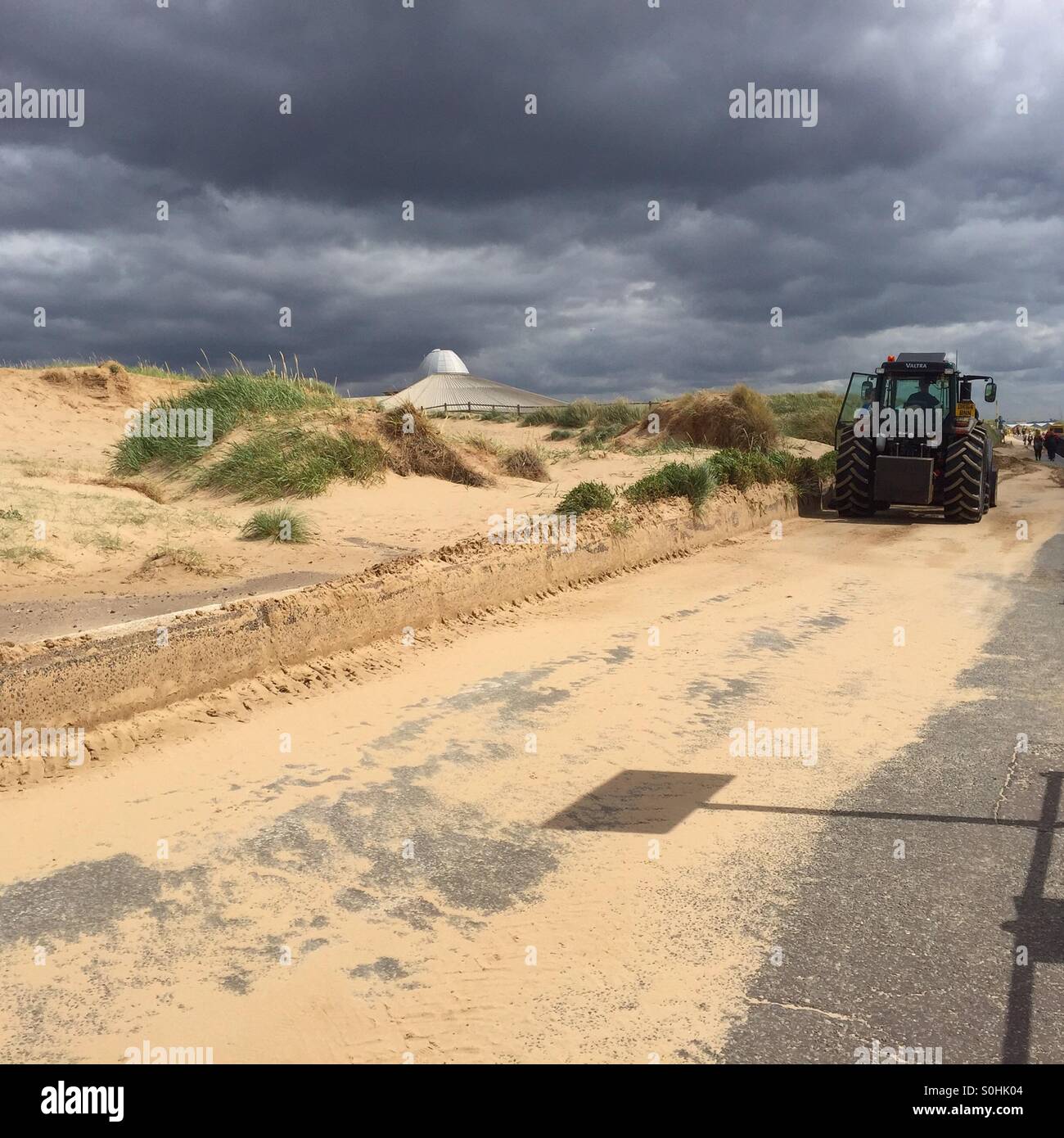 Clearing sand from promenade hi-res stock photography and images - Alamy