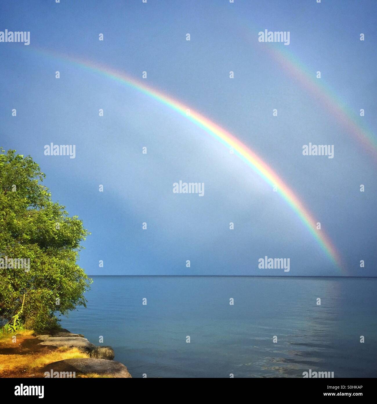 Double rainbow over Lake Ontario after the storm Stock Photo - Alamy