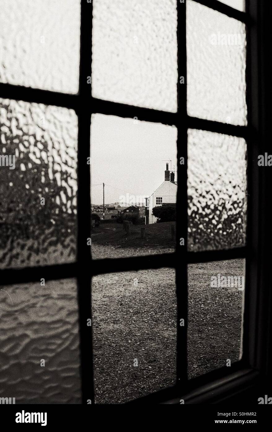 Peeking through a window Stock Photo - Alamy