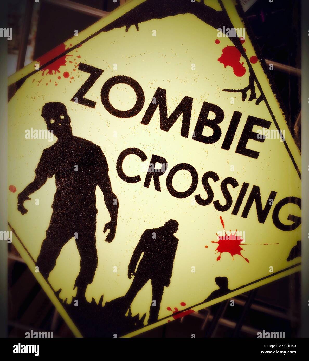 Zombie crossing Halloween sign Stock Photo - Alamy