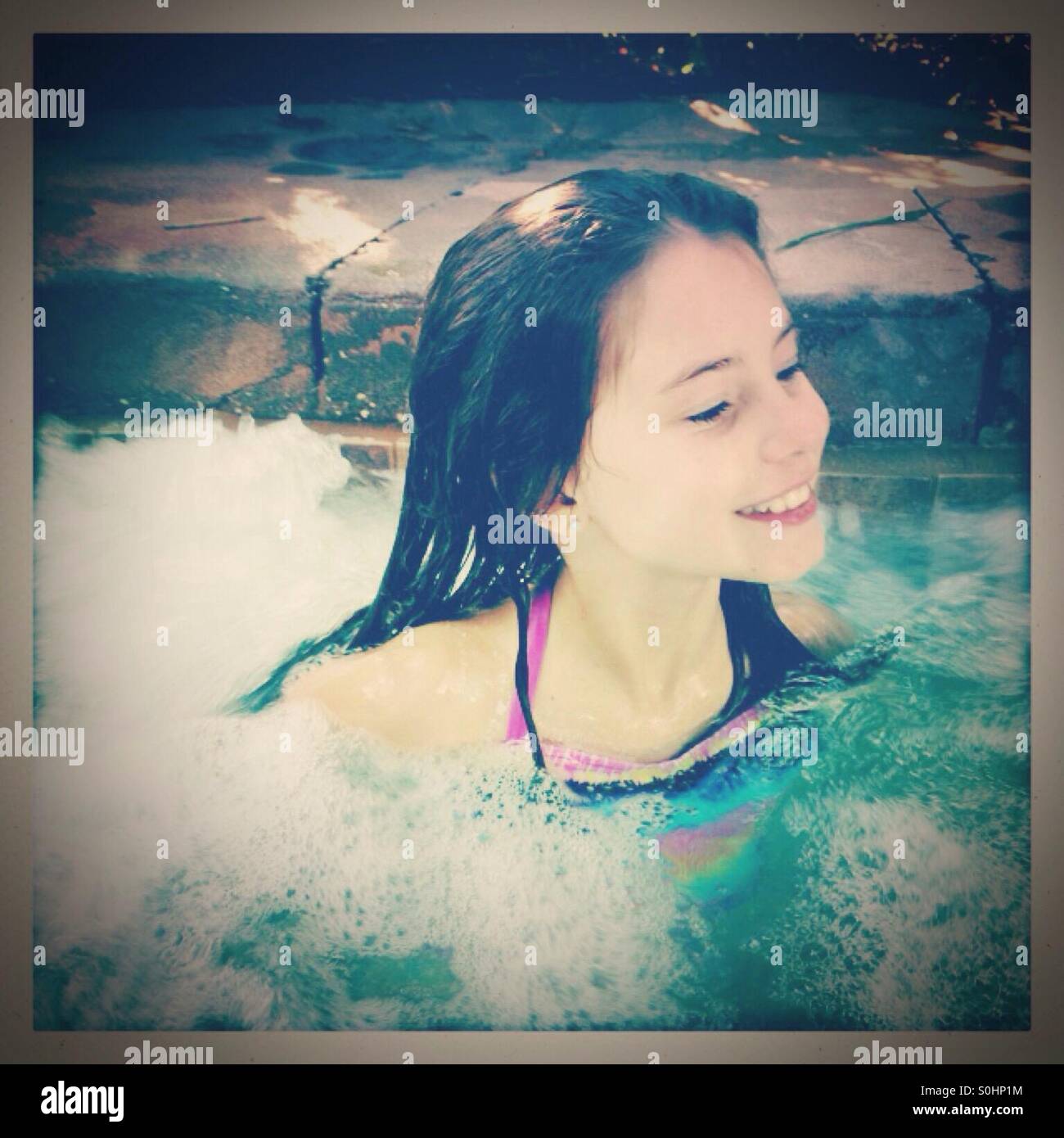 Girl child jacuzzi hi-res stock photography and images - Alamy