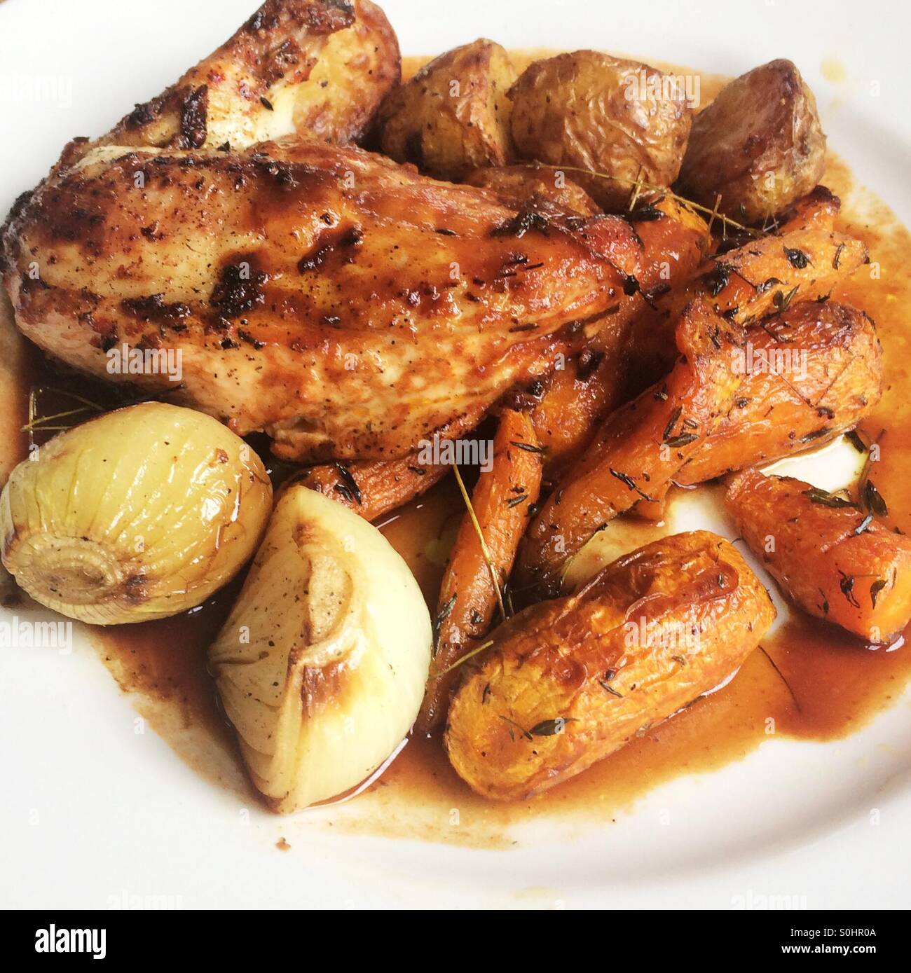 Roast chicken sunday dinner gravy hi-res stock photography and images ...