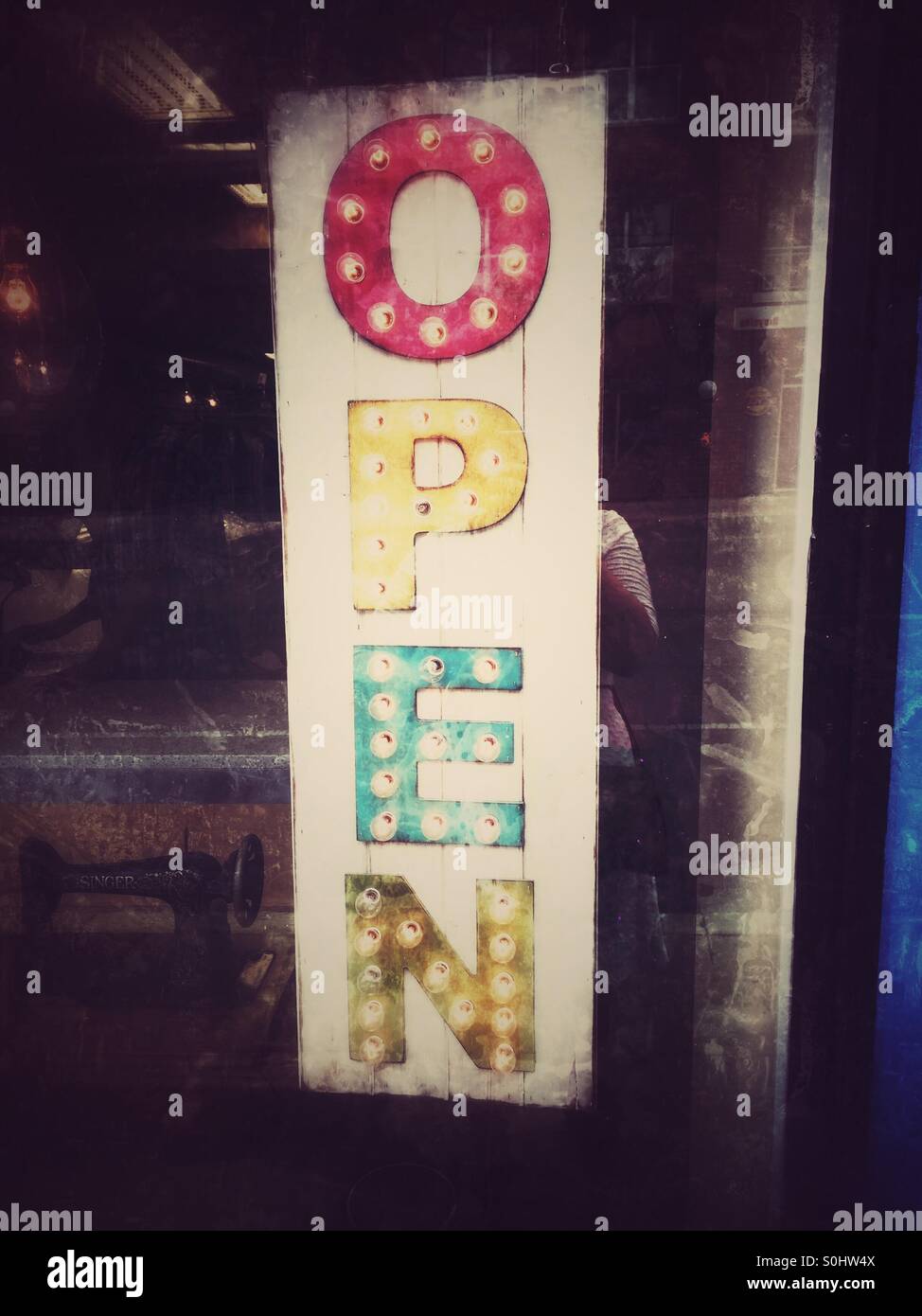 Open sign in shop window Stock Photo - Alamy