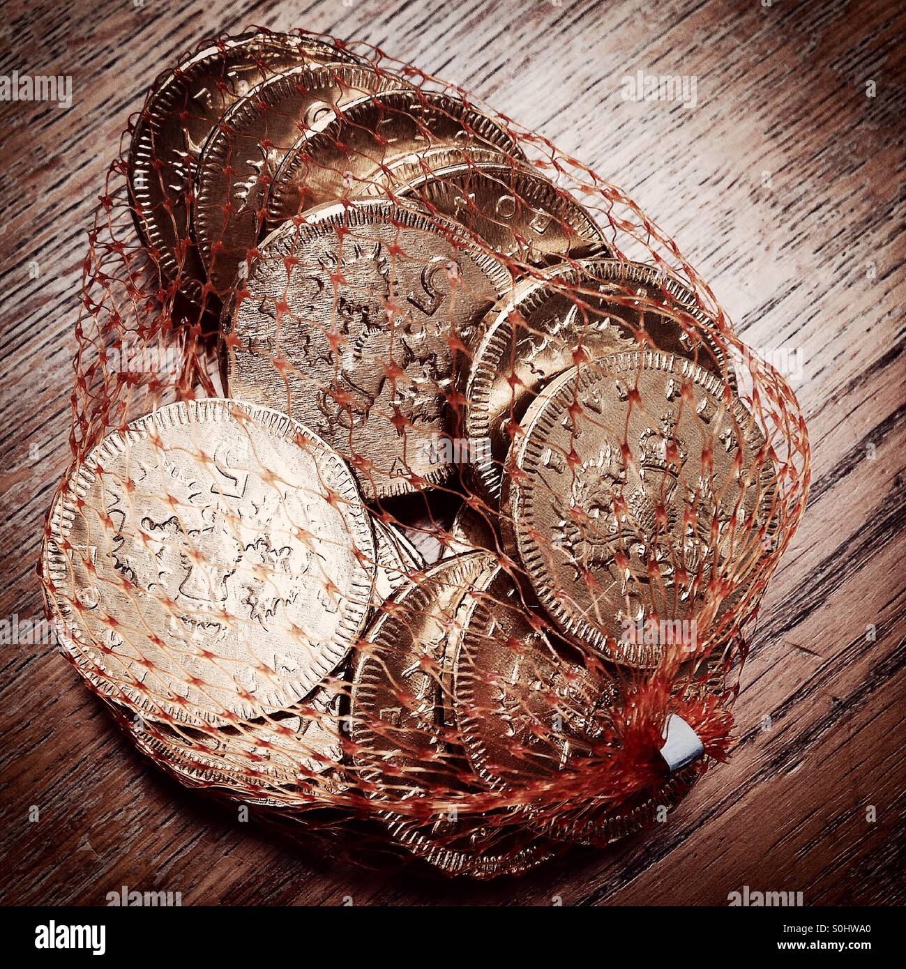 Bag chocolate coins hi-res stock photography and images - Alamy
