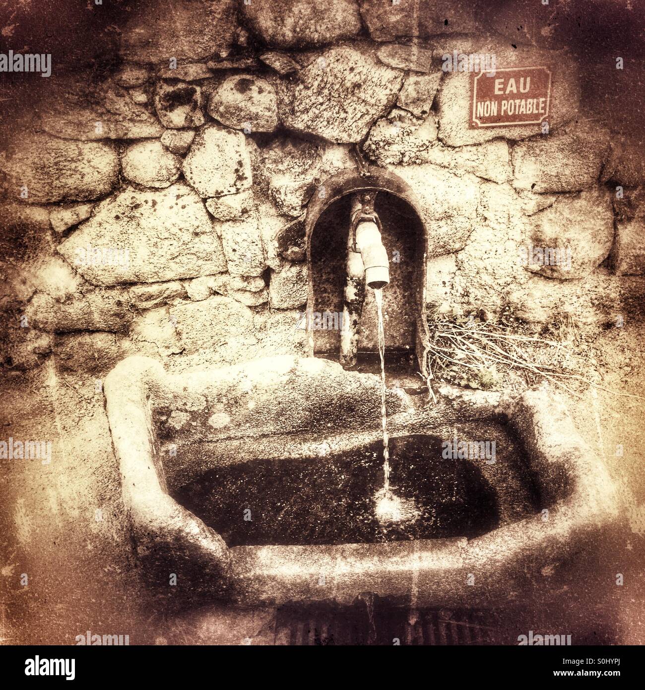 Spring water tap Stock Photo - Alamy