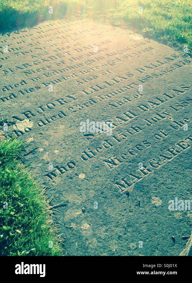 Sunlight on gravestone Stock Photo - Alamy