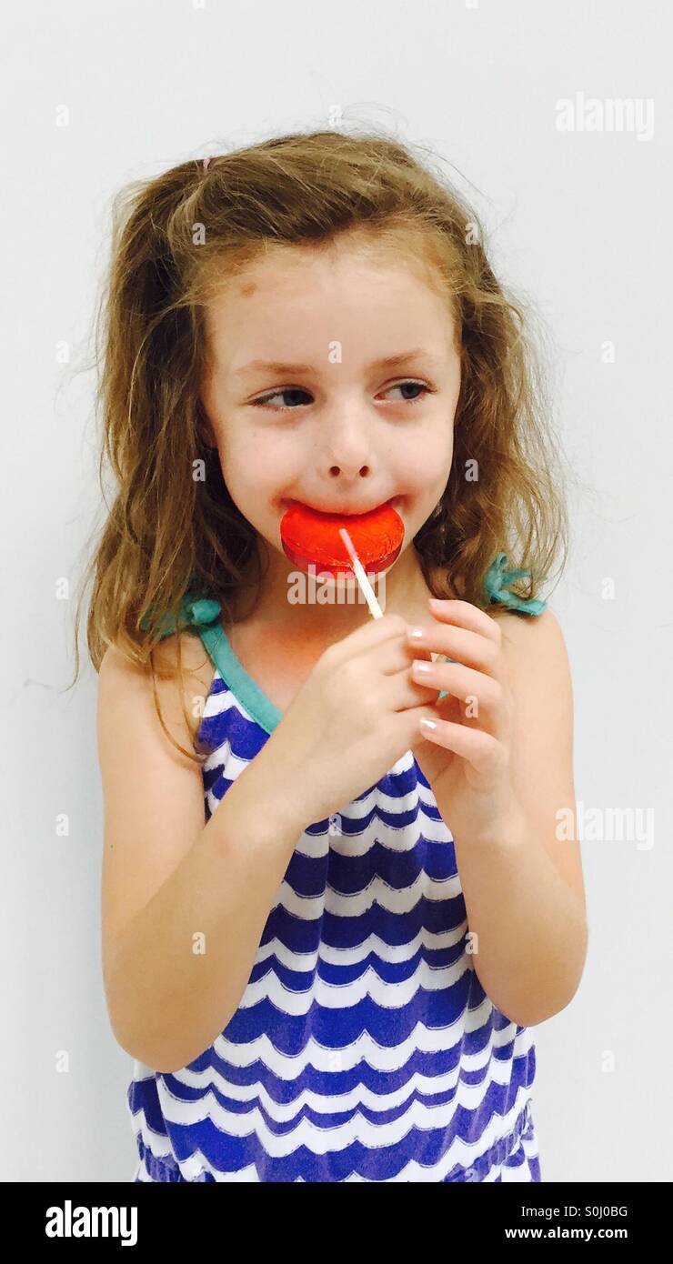 Girl With A Lollipop High Resolution Stock Photography and Images - Alamy