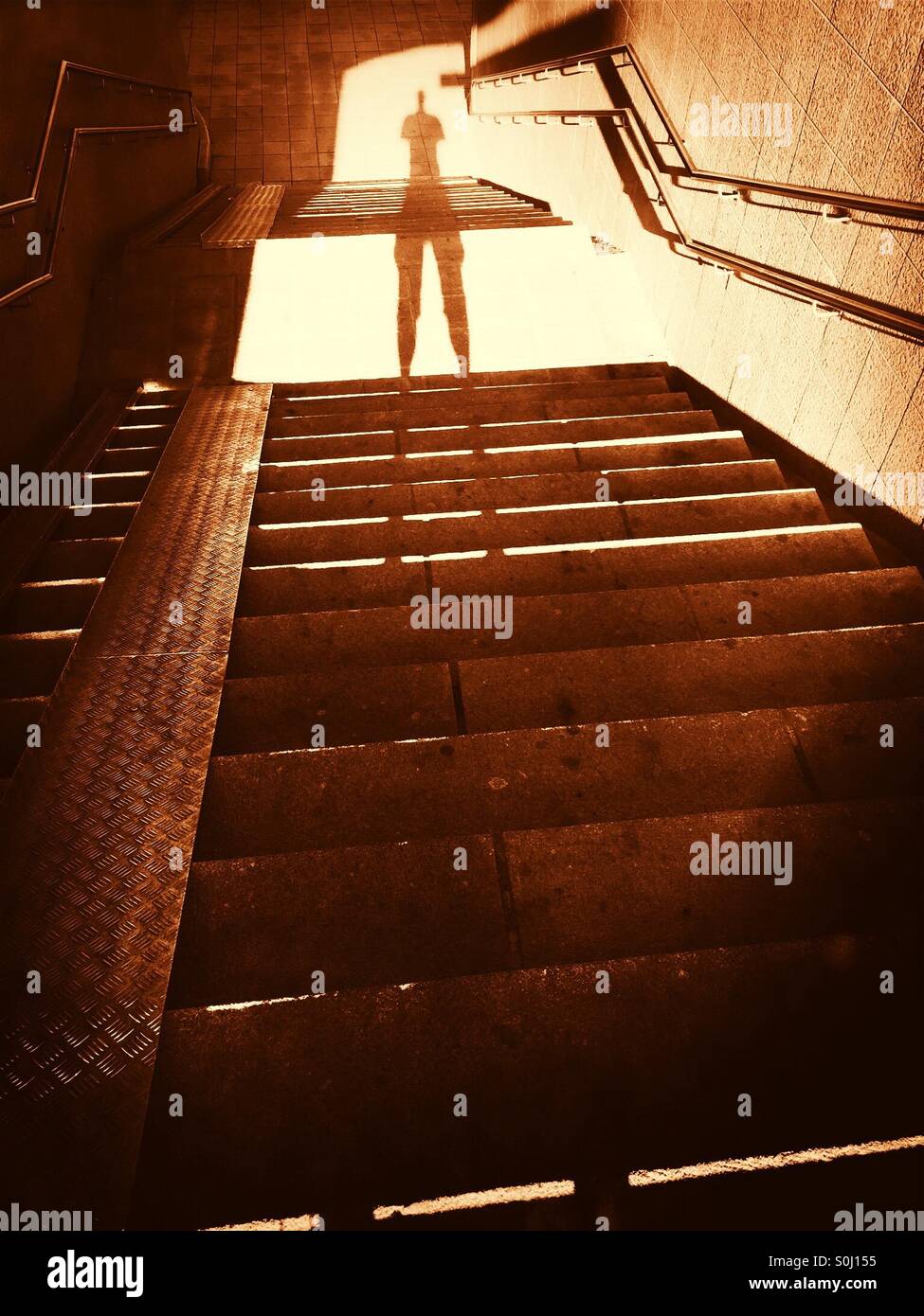 Shadow man stairs hi-res stock photography and images - Alamy