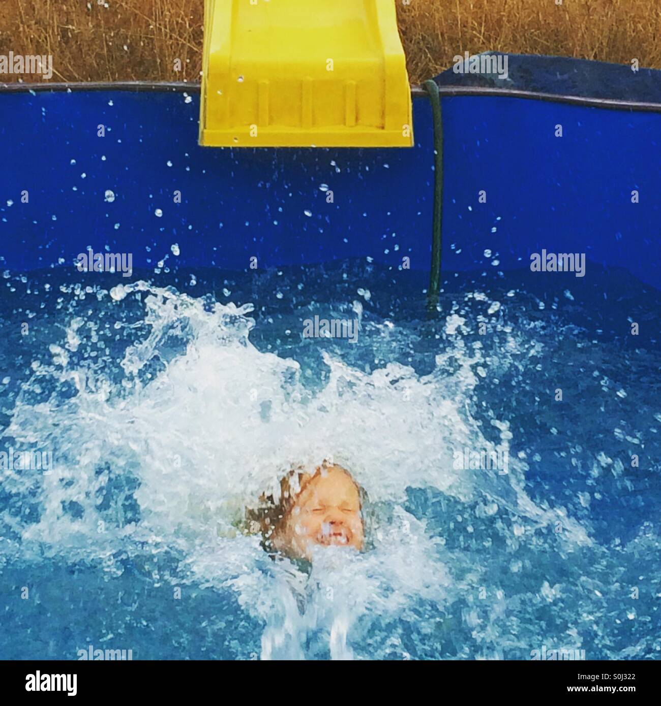 Slide pool water slides hi-res stock photography and images - Alamy