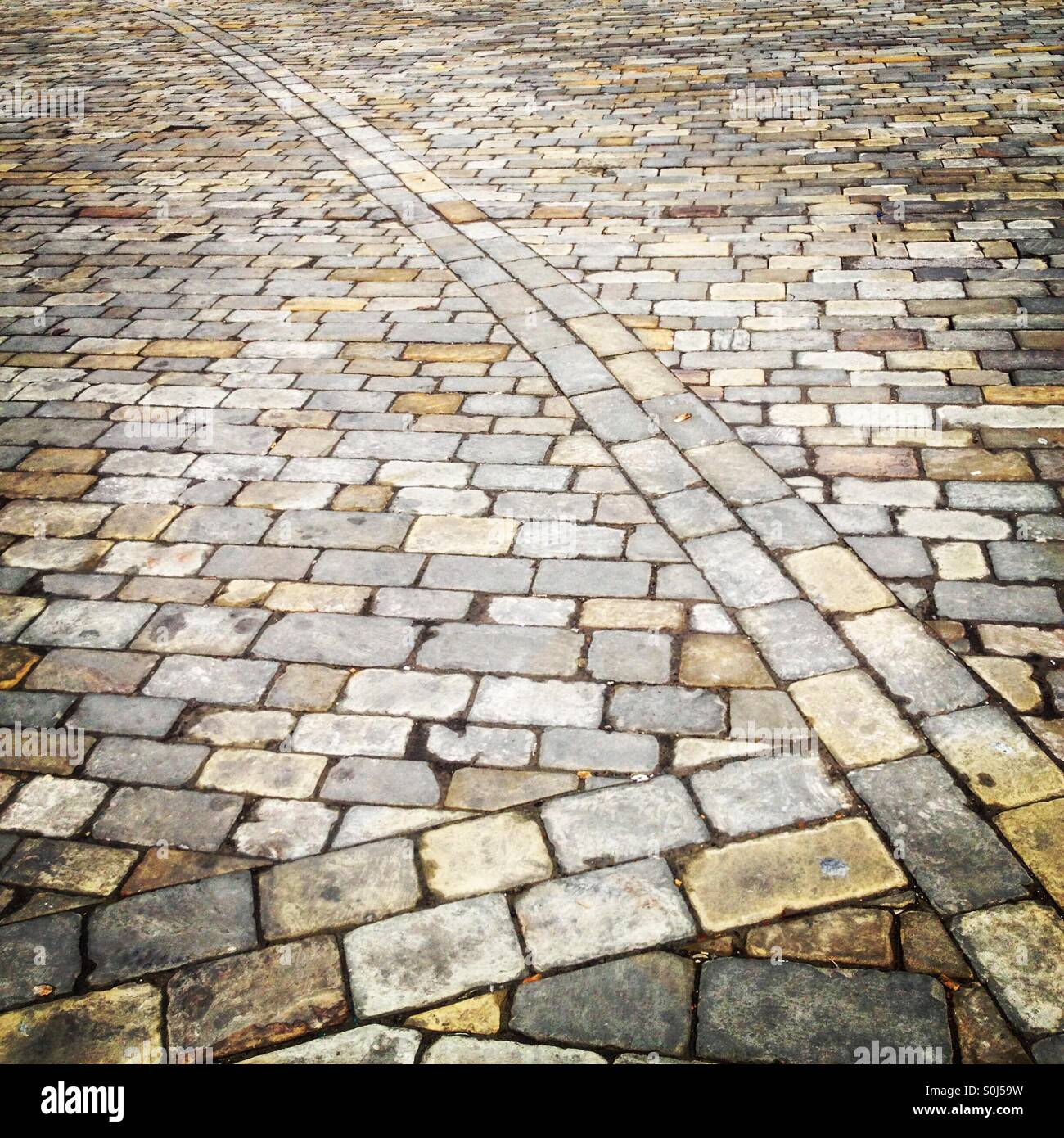 Cobbled street texture hi-res stock photography and images - Alamy