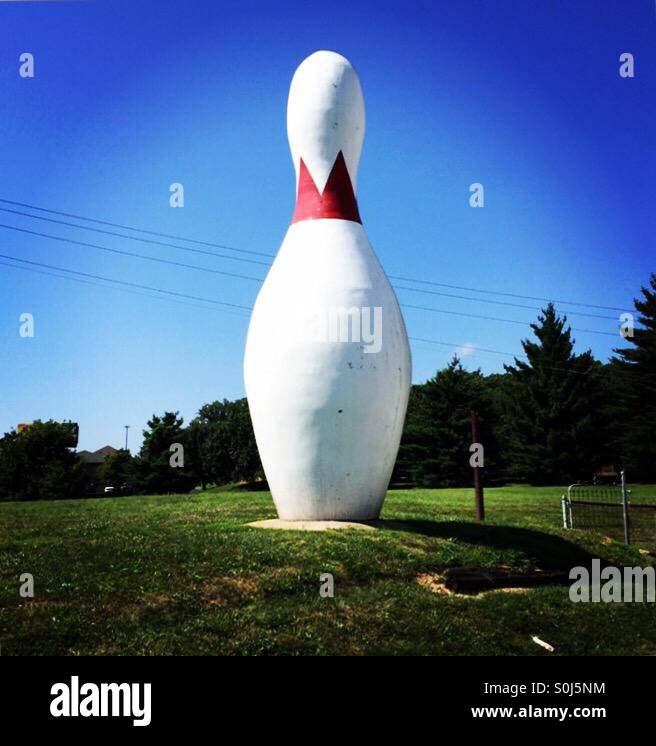 A large statue of a bowling pin Stock Photo - Alamy