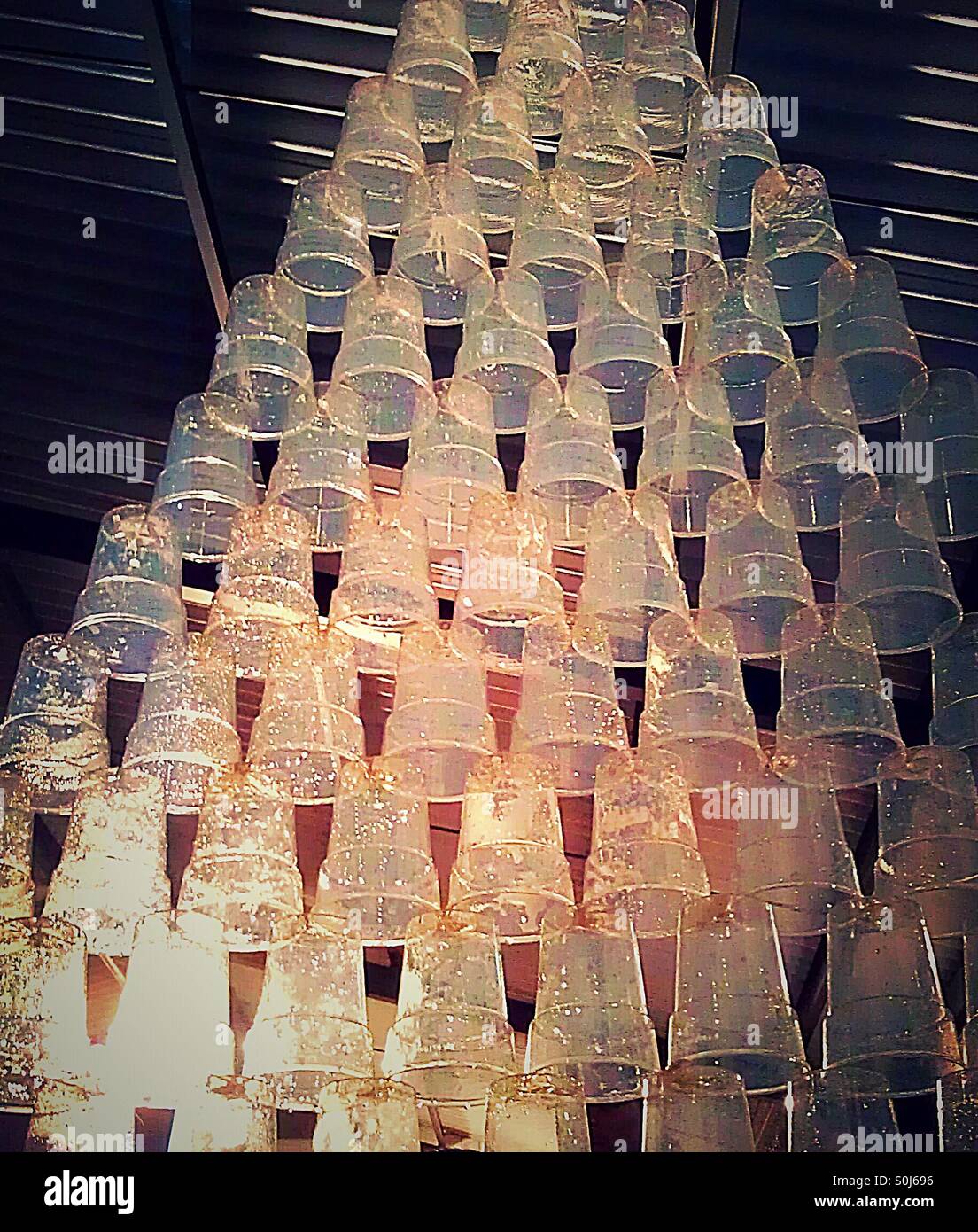 Pint glasses stacked into a high pyramid Stock Photo - Alamy