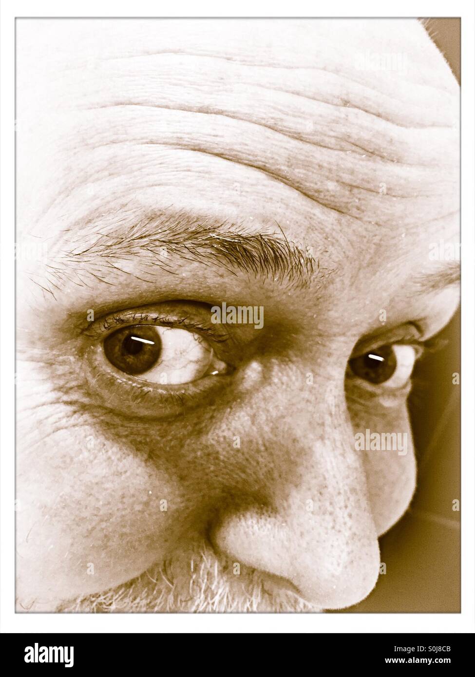 Wrinkled forehead man hi-res stock photography and images - Alamy