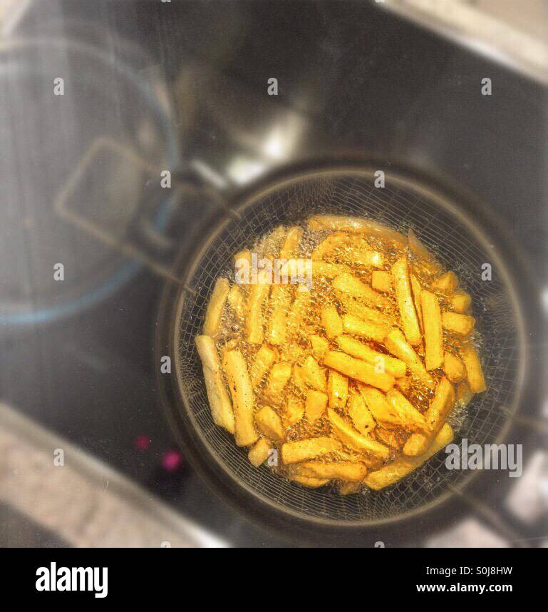 Frying French fries Stock Photo - Alamy