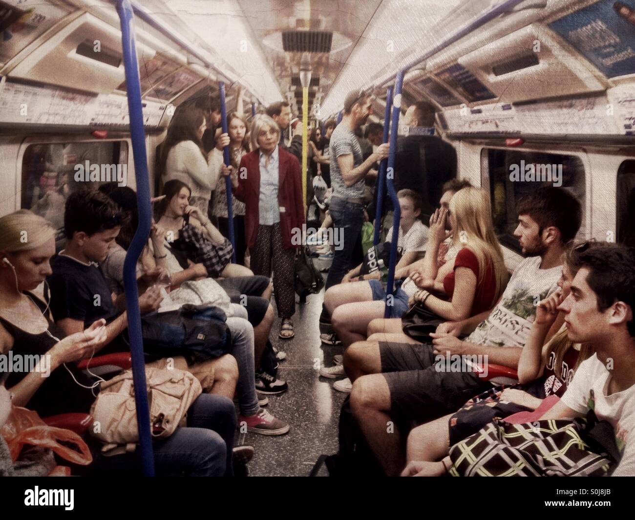 A busy London Underground train Stock Photo - Alamy