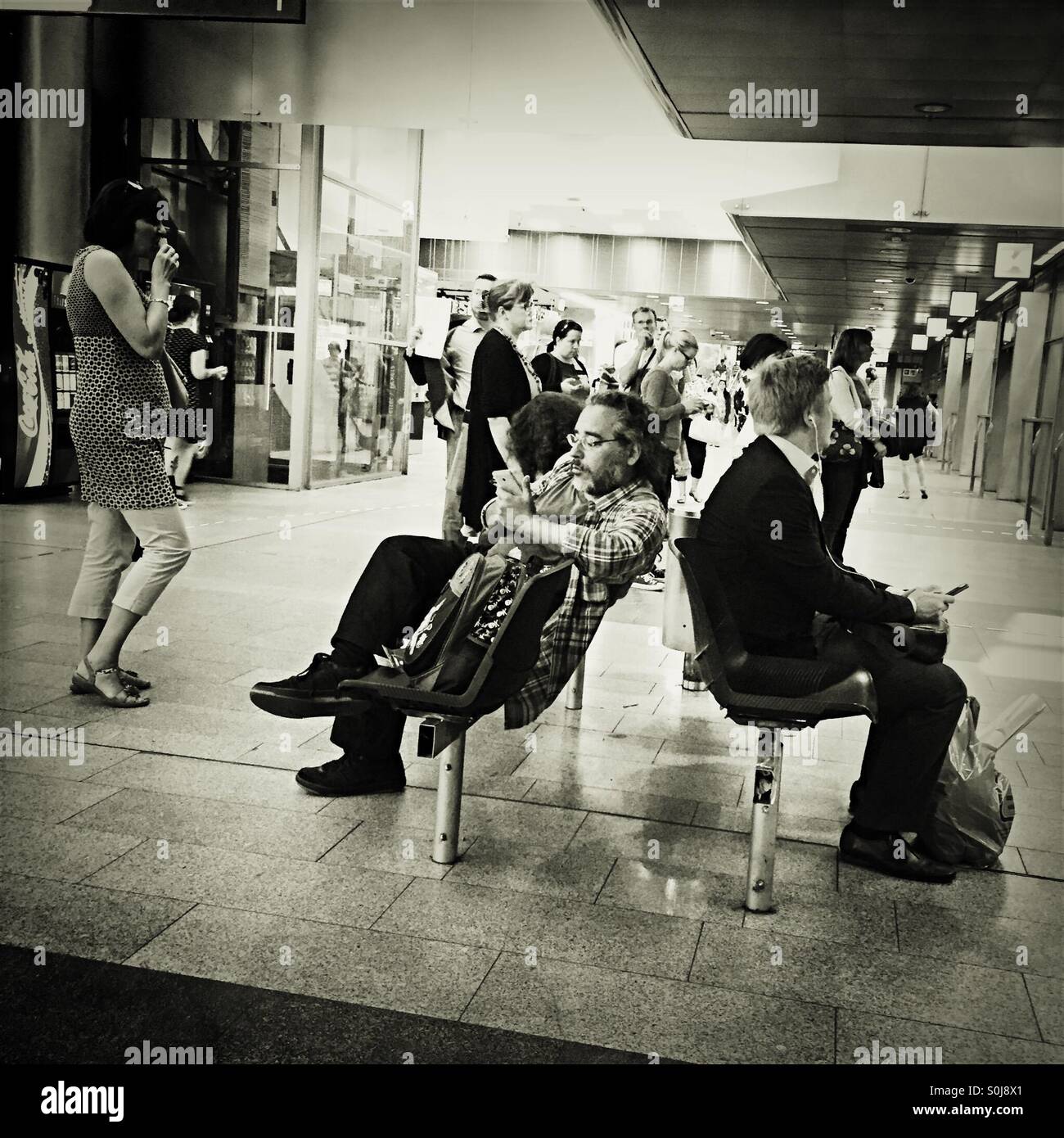 People waiting for the bus in Helsinki Stock Photo - Alamy