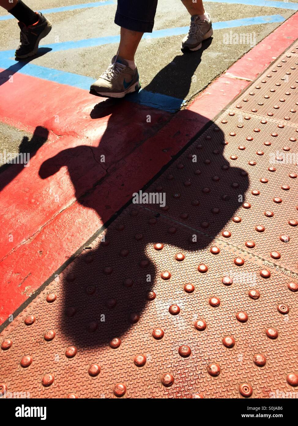 Shadows two people walking hi-res stock photography and images - Alamy