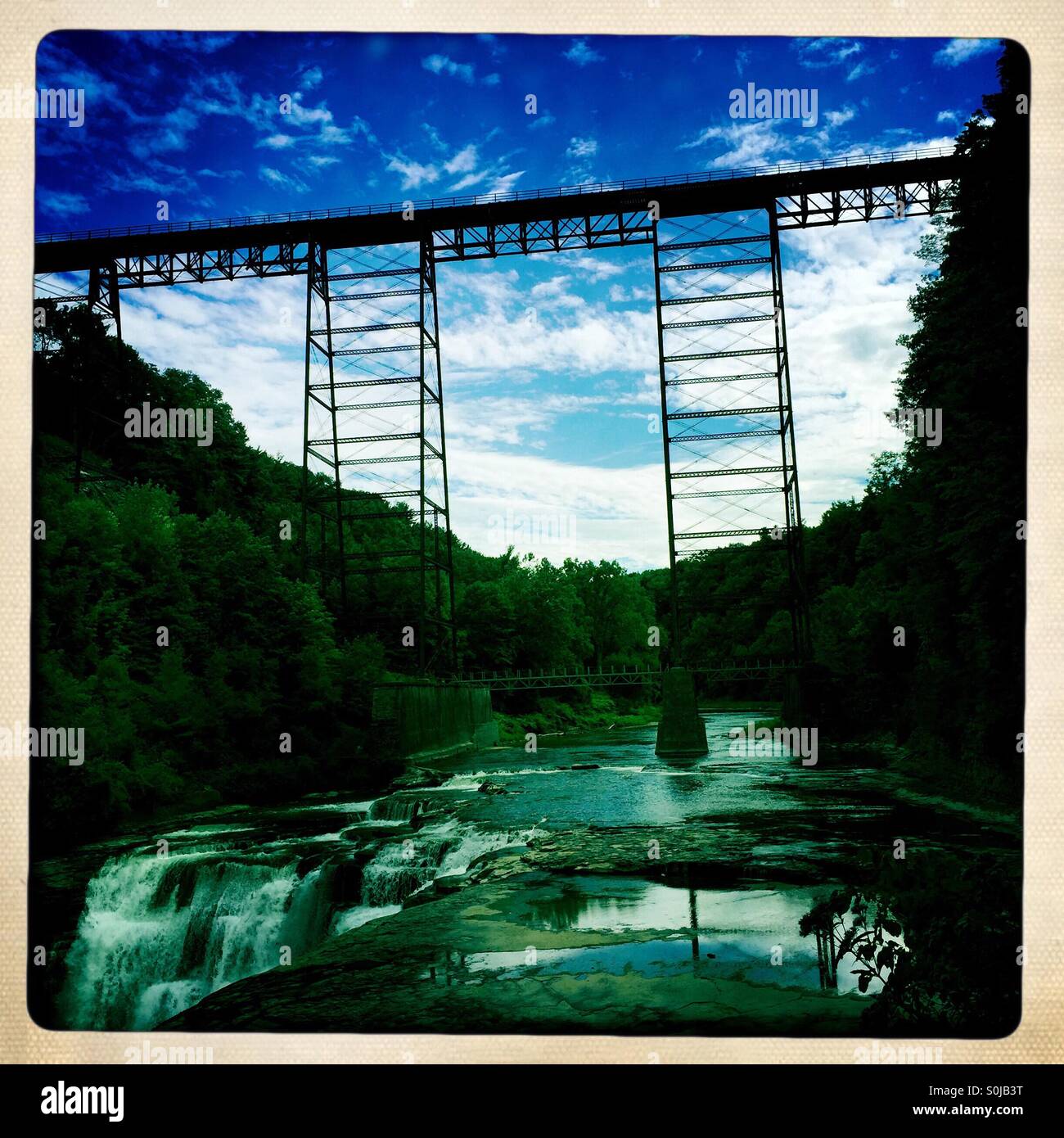 Waterfalls under bridge in hi-res stock photography and images - Alamy