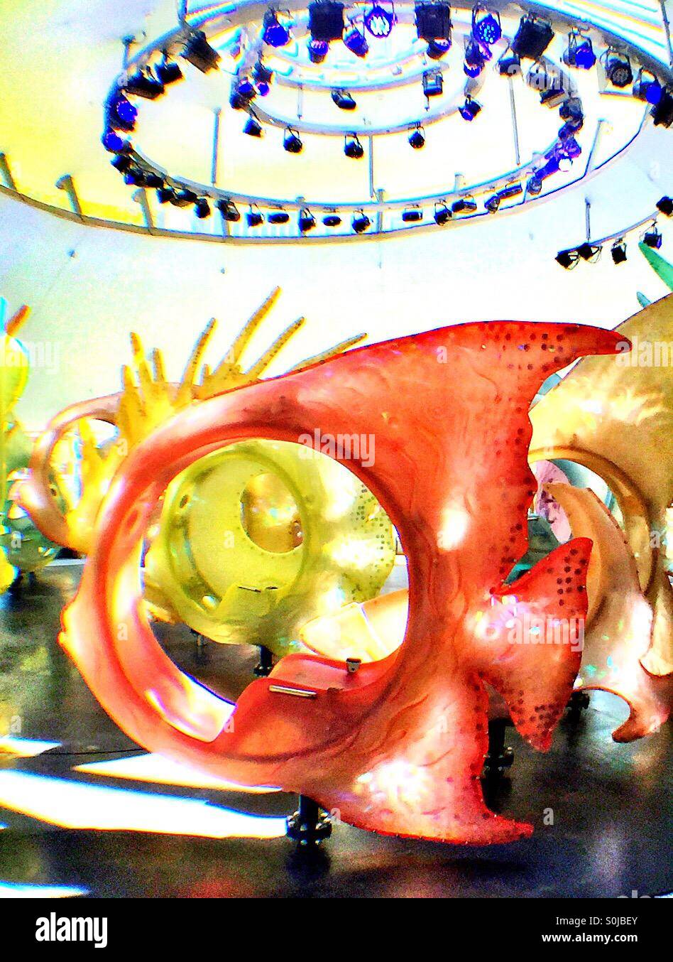 Brightly colored fiberglass fish ride at the Seaglass carousel in ...
