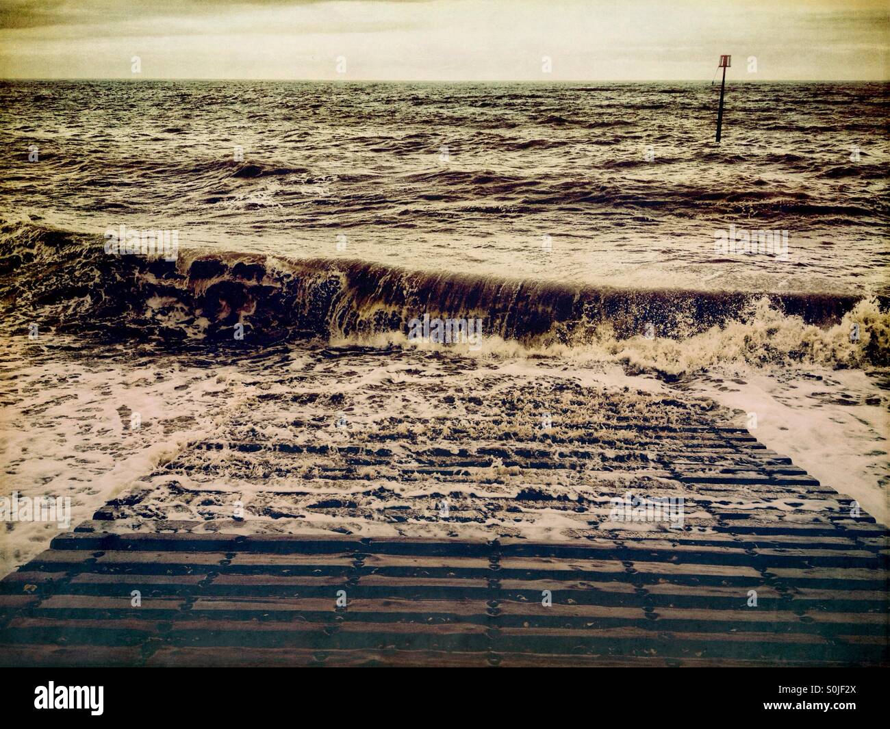 Wooden boat launching ramp Stock Photo - Alamy