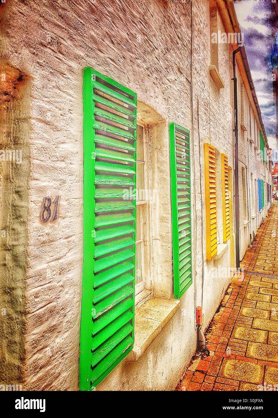 Colourful shutters in Sheen, London Stock Photo - Alamy