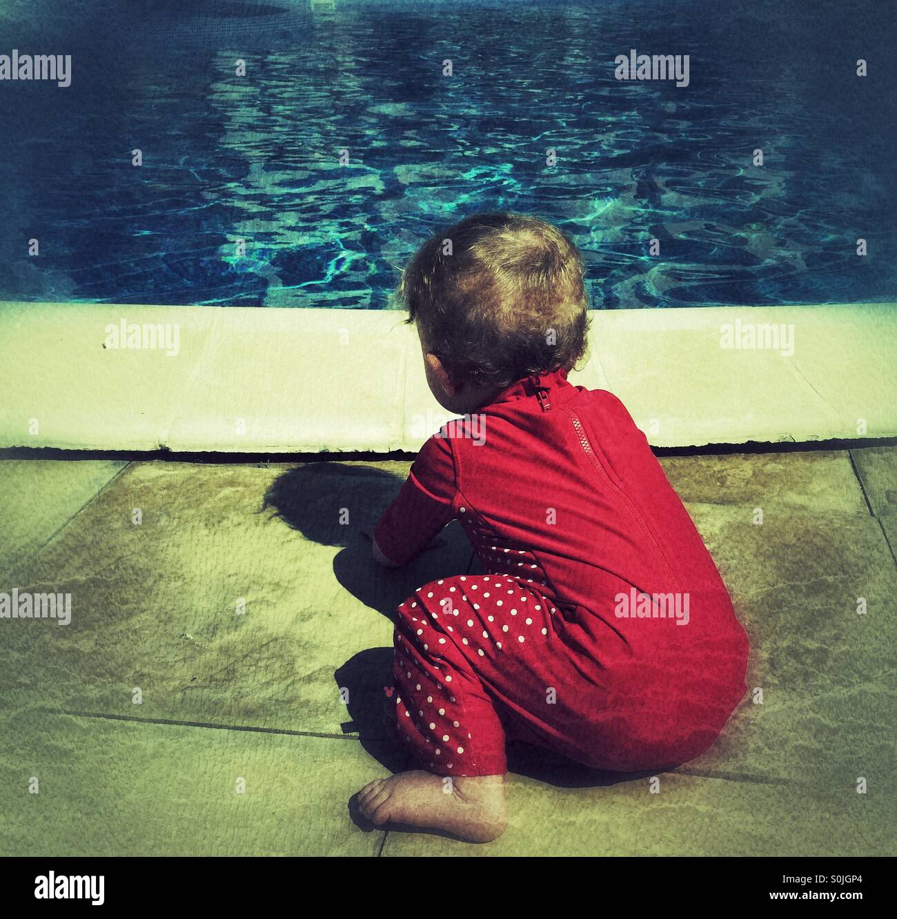 Baby danger swimming pool Stock Photo - Alamy