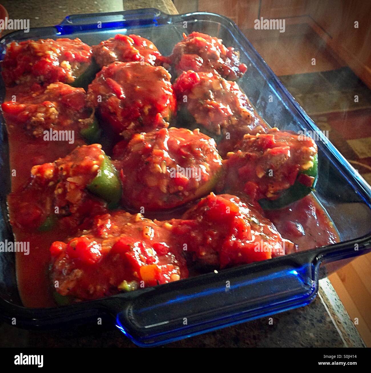 Piping hot stuffed peppers Stock Photo - Alamy