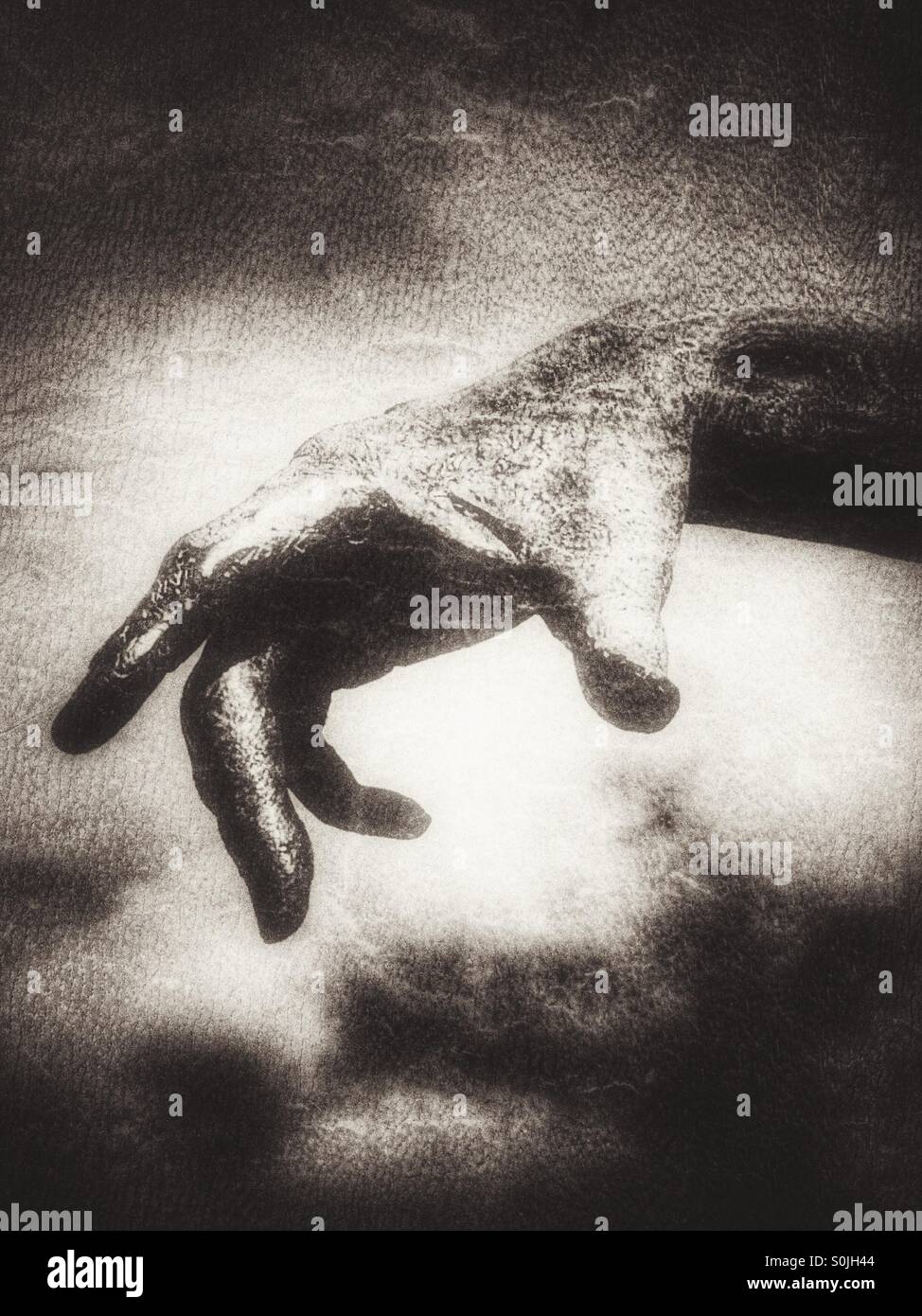 Hand grasping hi-res stock photography and images - Alamy