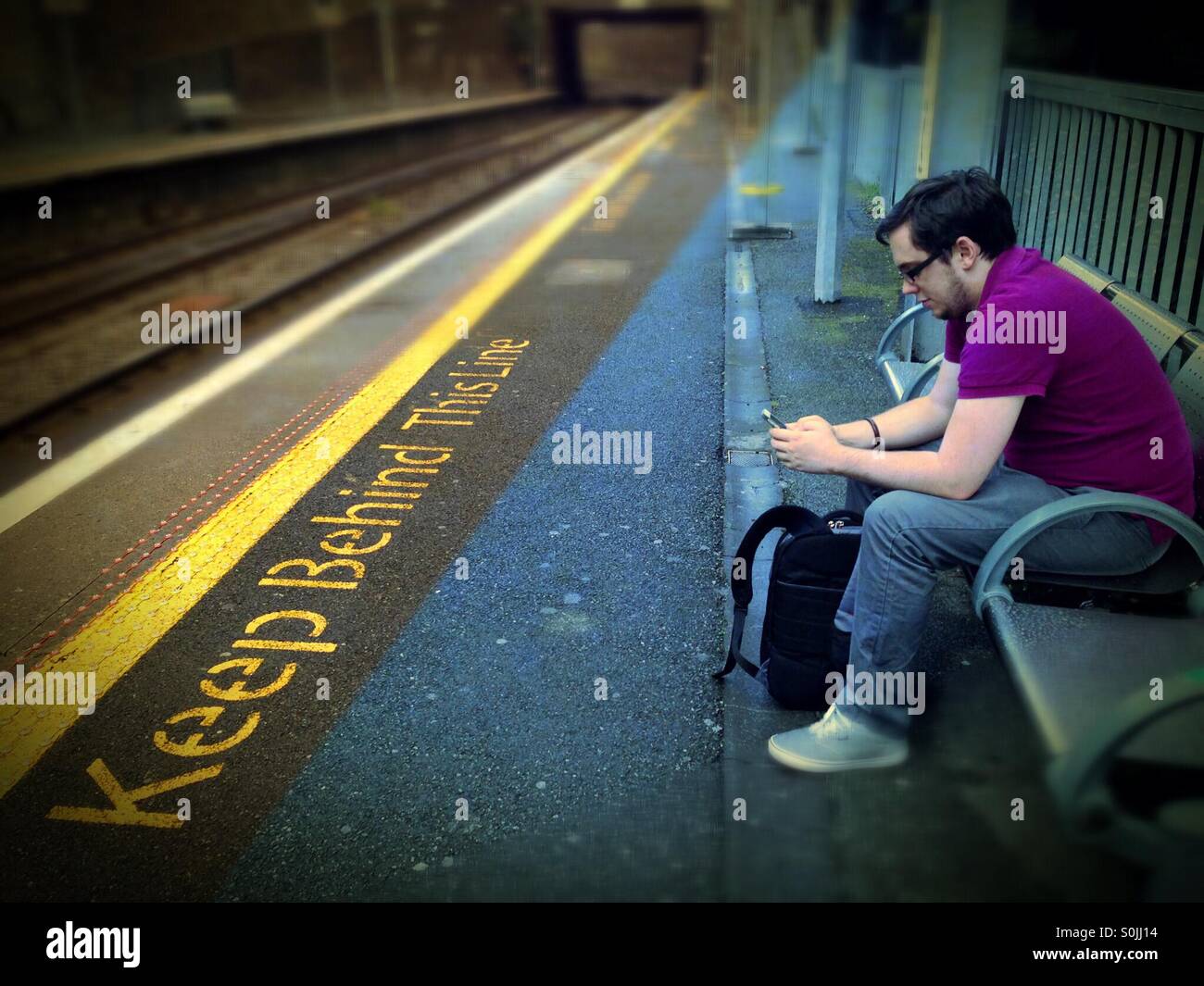Keep behind the yellow line hi-res stock photography and images - Alamy