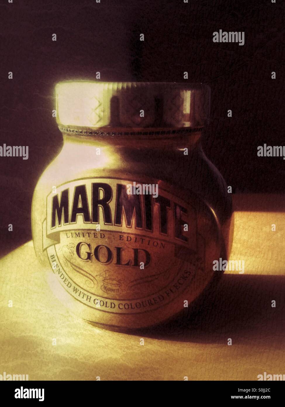 Limited edition jar of gold Marmite Stock Photo - Alamy