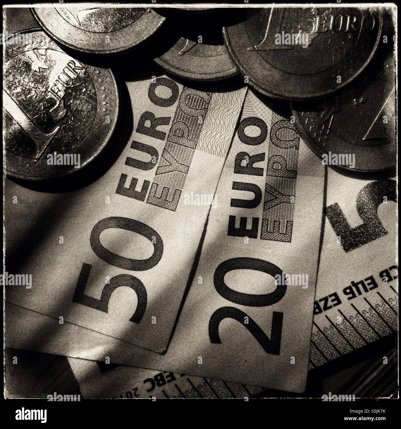 "Loose change..." Spanish Euro notes and coins Stock Photo - Alamy