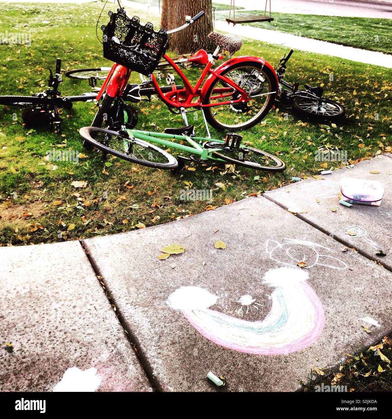 Bikes and sidewalk chalk Stock Photo - Alamy