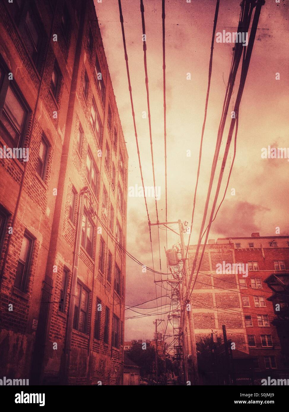 Apartment buildings and wires in the city Stock Photo - Alamy
