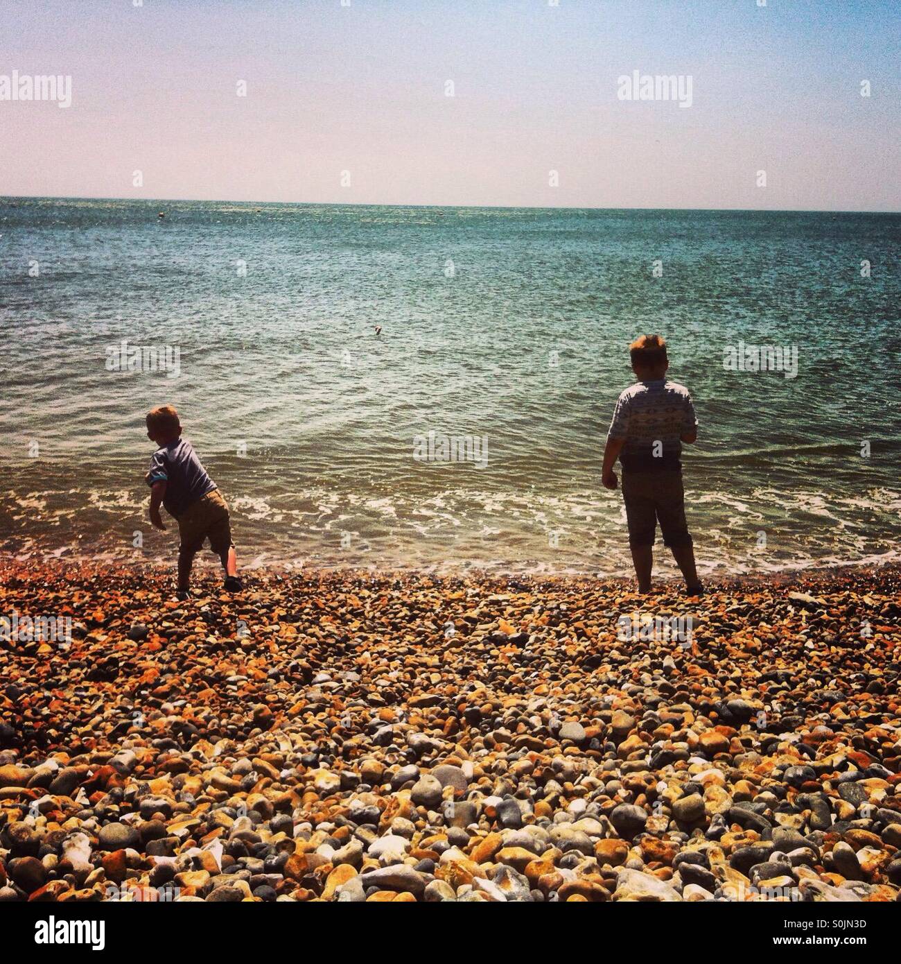 Throwing pebble hi-res stock photography and images - Alamy