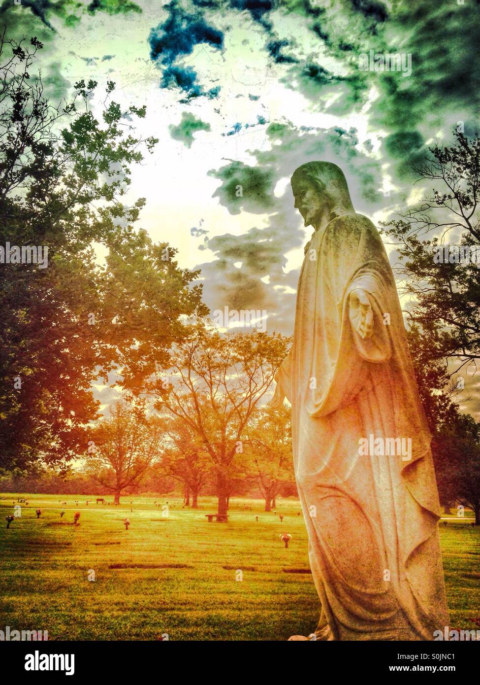 A side view of a Jesus statue with arms opened (1 Stock Photo - Alamy