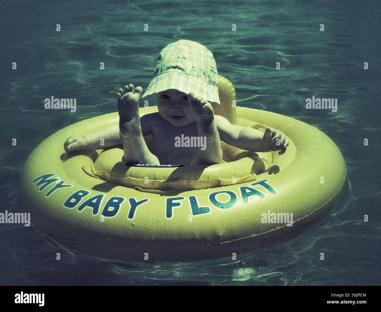 Baby in inflatable hi-res stock photography and images - Alamy