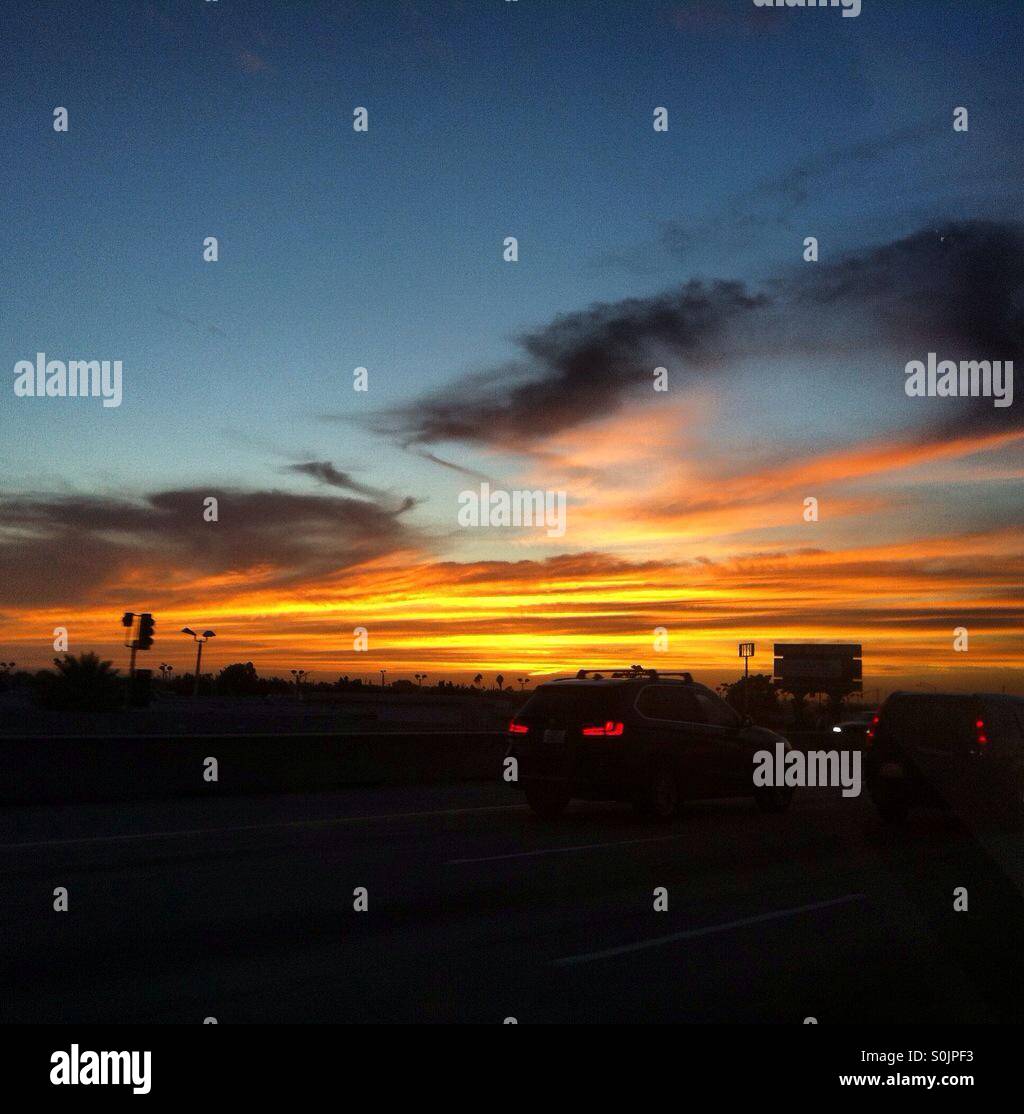 Beautiful sunset from freeway ride home Stock Photo - Alamy
