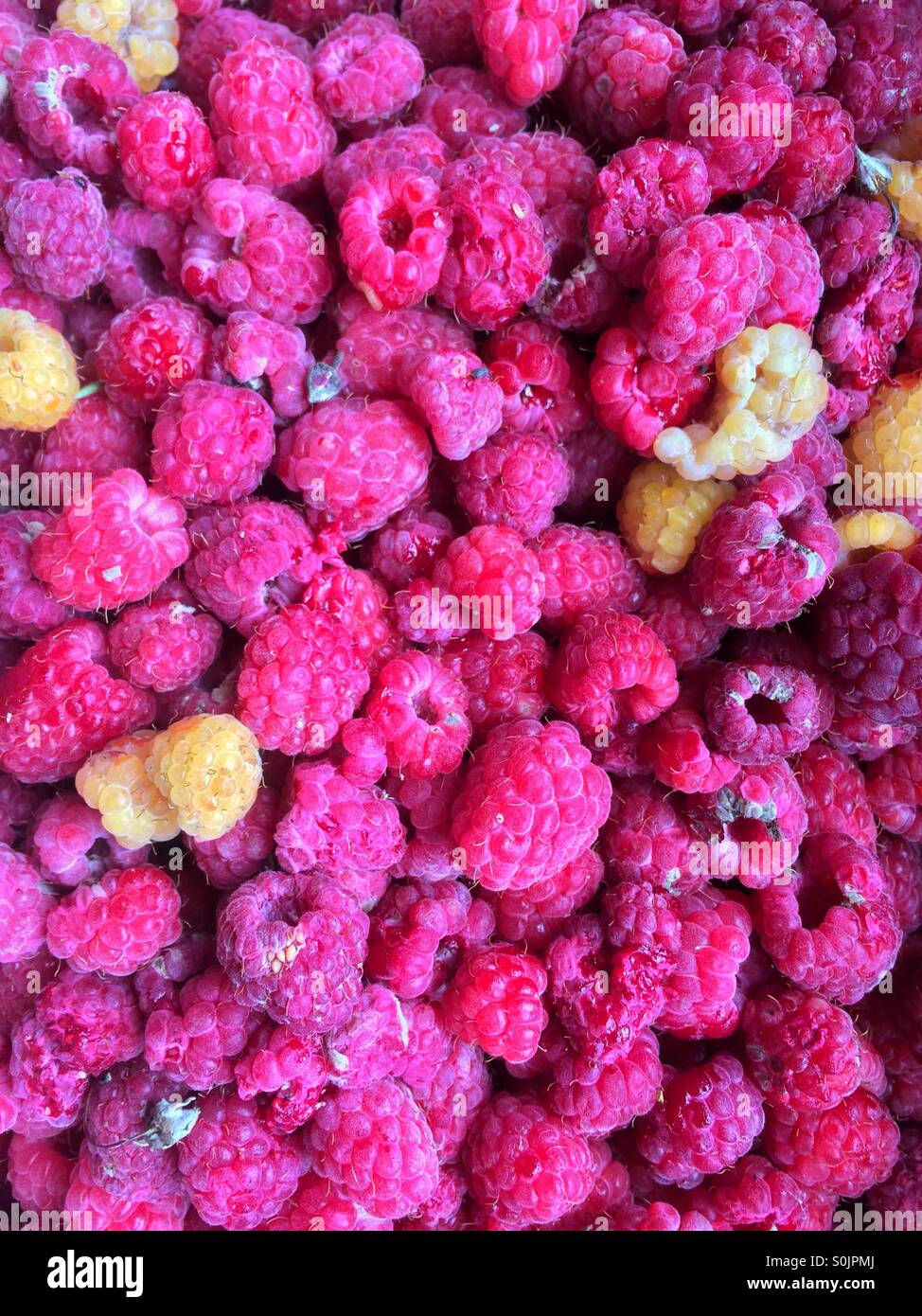 raspberries texture background Stock Photo - Alamy