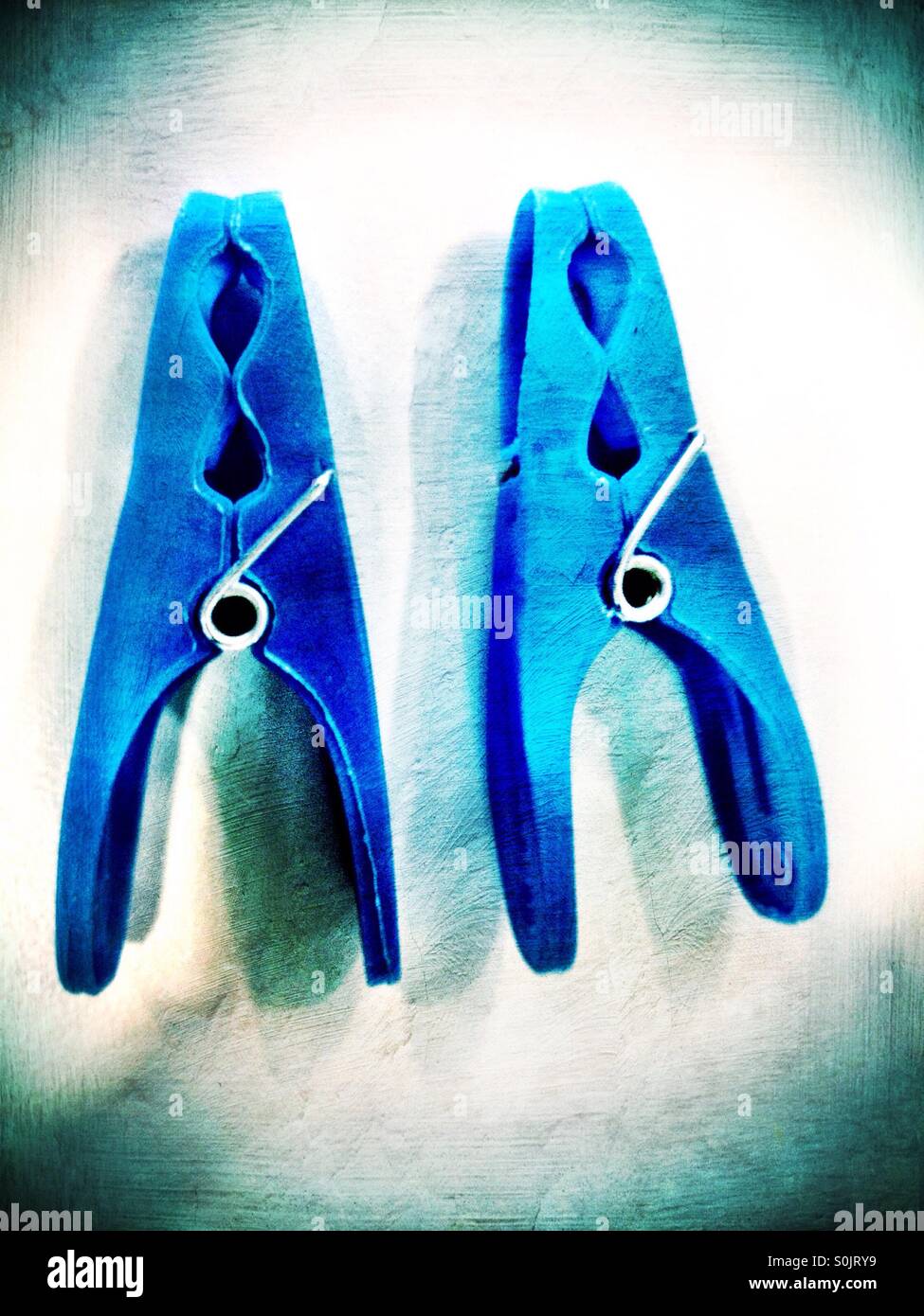 Plastic clothes pegs Stock Photo - Alamy