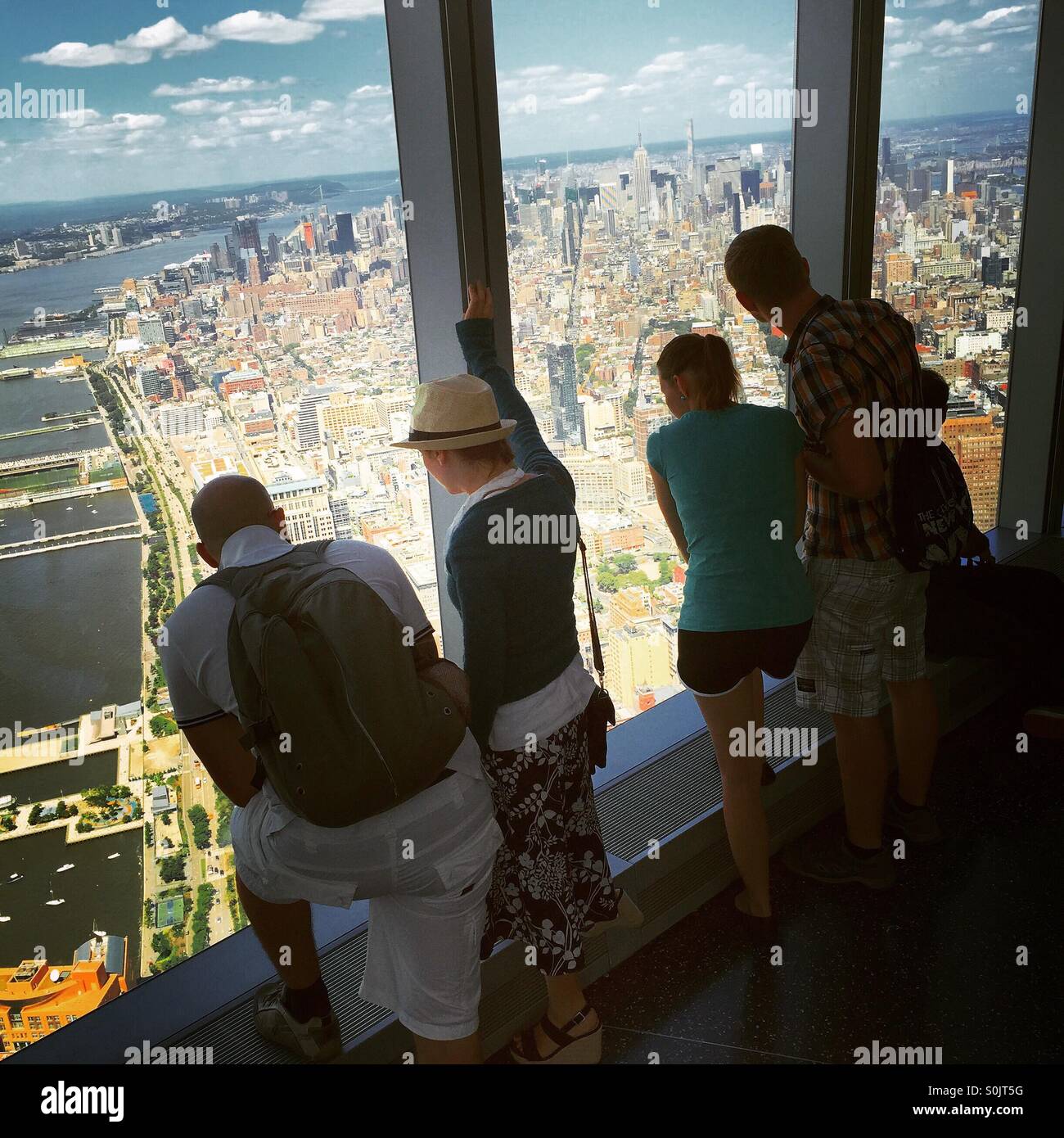 People view Manhattan buildings from Freedom Tower Stock Photo - Alamy