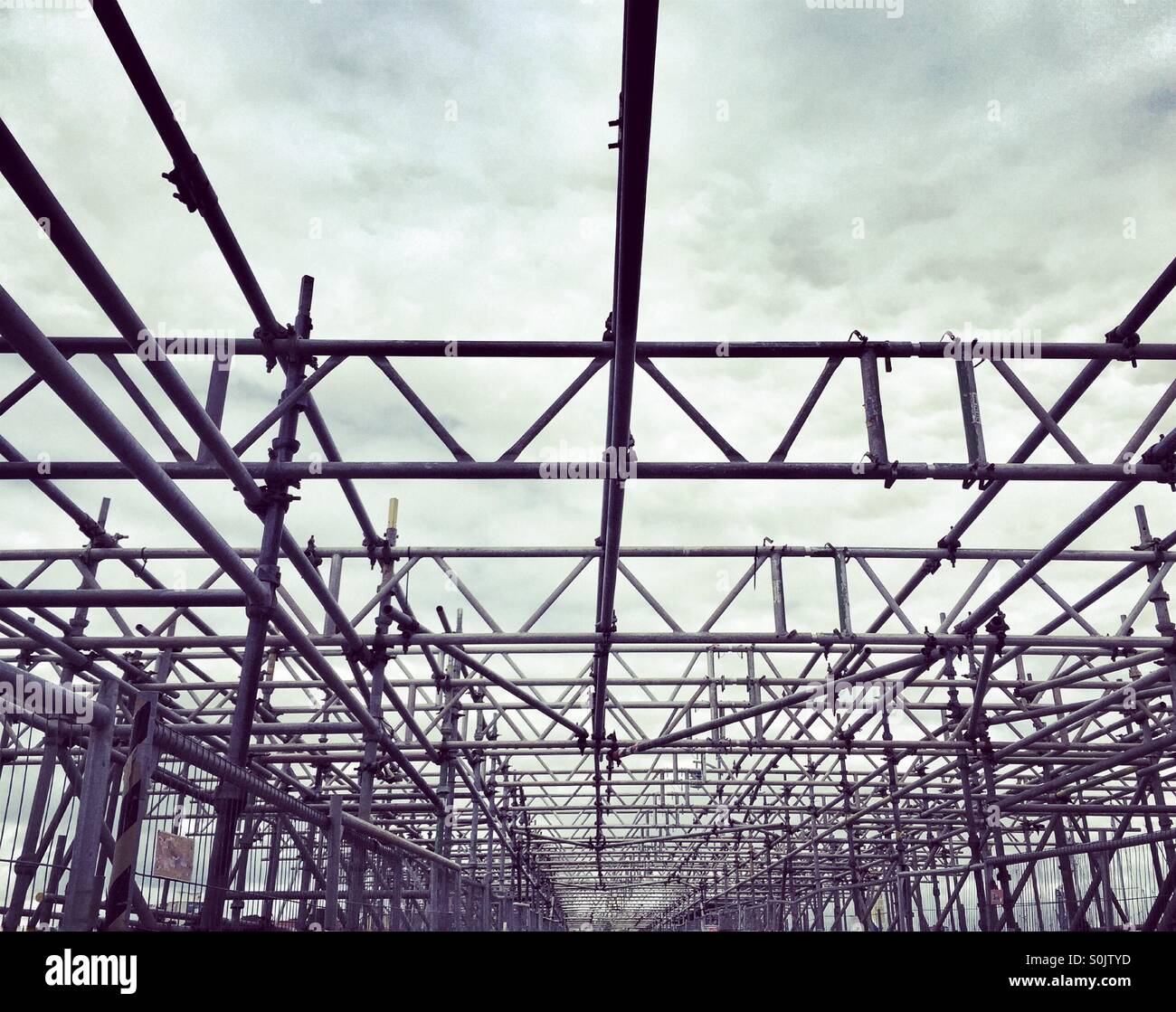 Overhead scaffolding on a bridge Stock Photo - Alamy