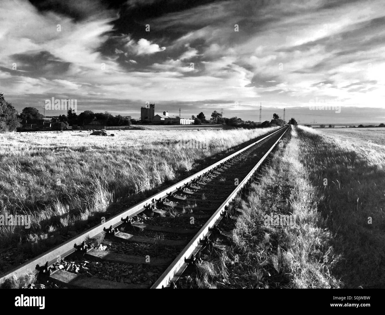 Landscape with railroad tracks Stock Photo - Alamy