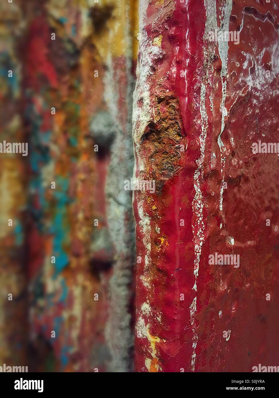Brightly painted rough textured wall Stock Photo - Alamy