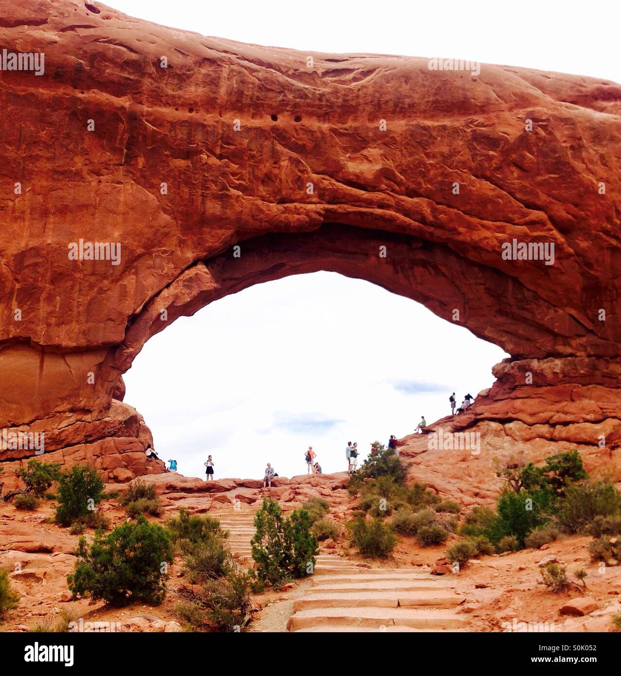 People Gathered in Arch Stock Photo - Alamy
