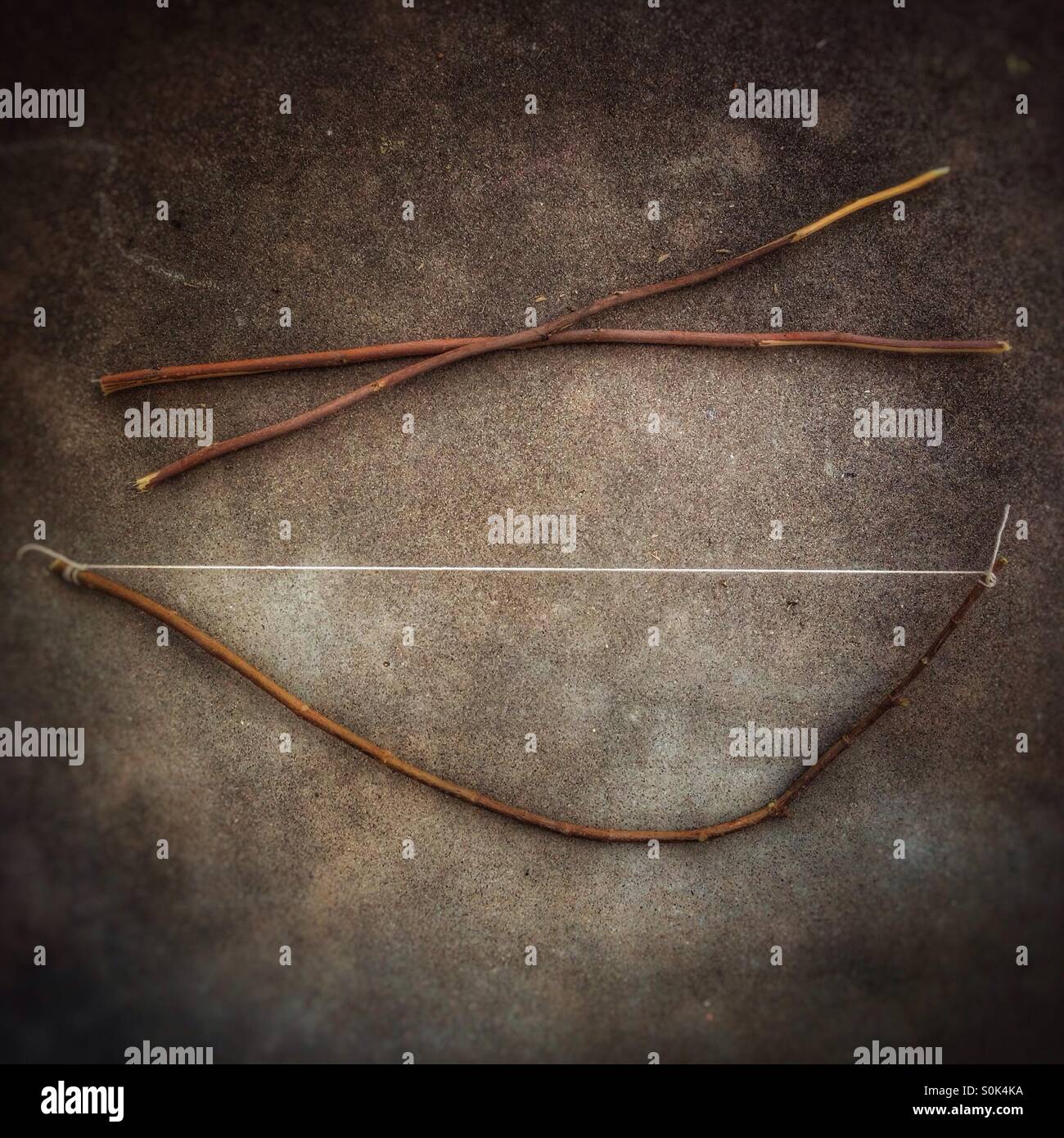 Hand made bow and arrows toy Stock Photo - Alamy